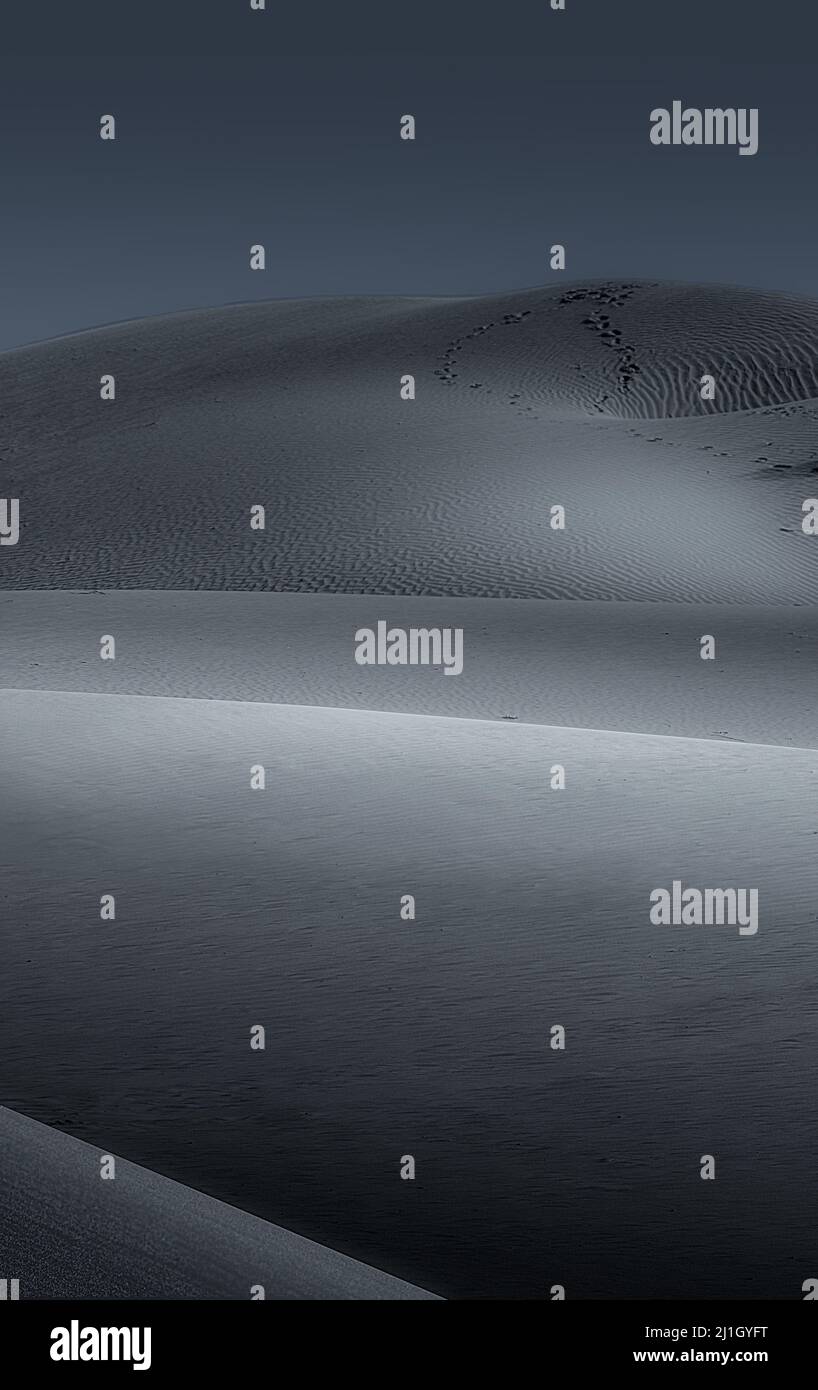 A wallpaper of Black Sahara sands and dunes Stock Photo - Alamy