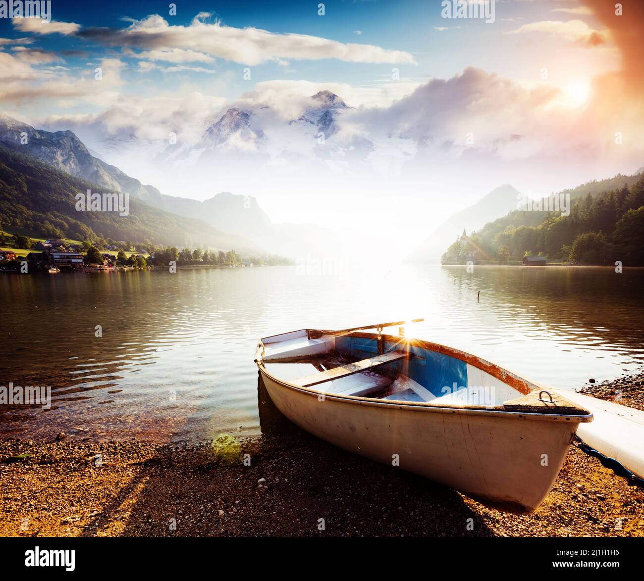 Fantastic views of the morning lake glowing by sunlight. Dramatic and ...