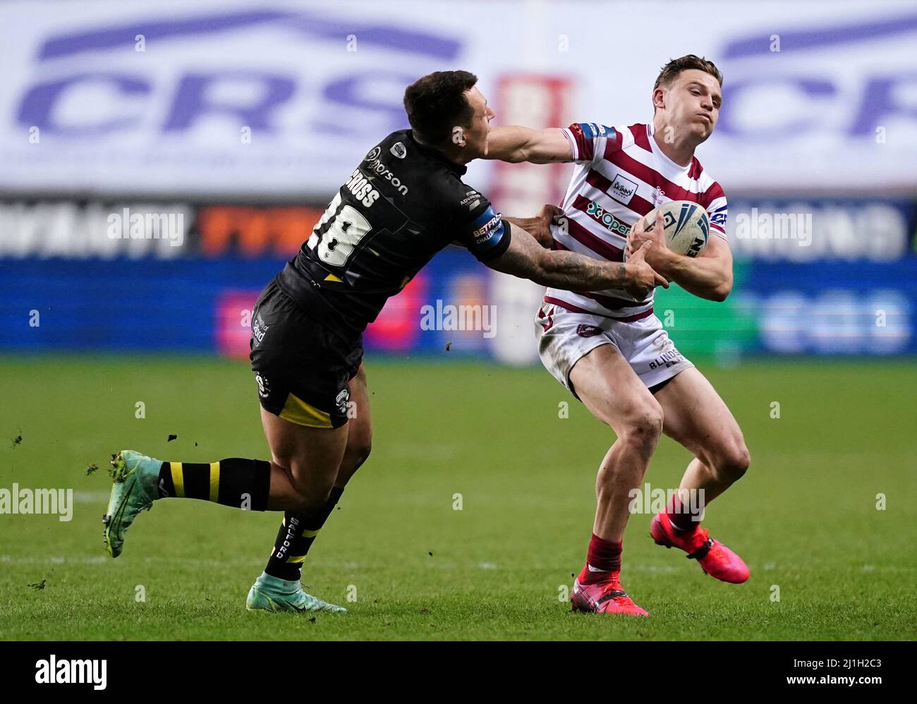 Wigan Warriors Jai Field (right) is tackled by Salford Red Devils Deon ... Wigan Warriors Jai Field (right) is tackled by Salford Red Devils Deon ...