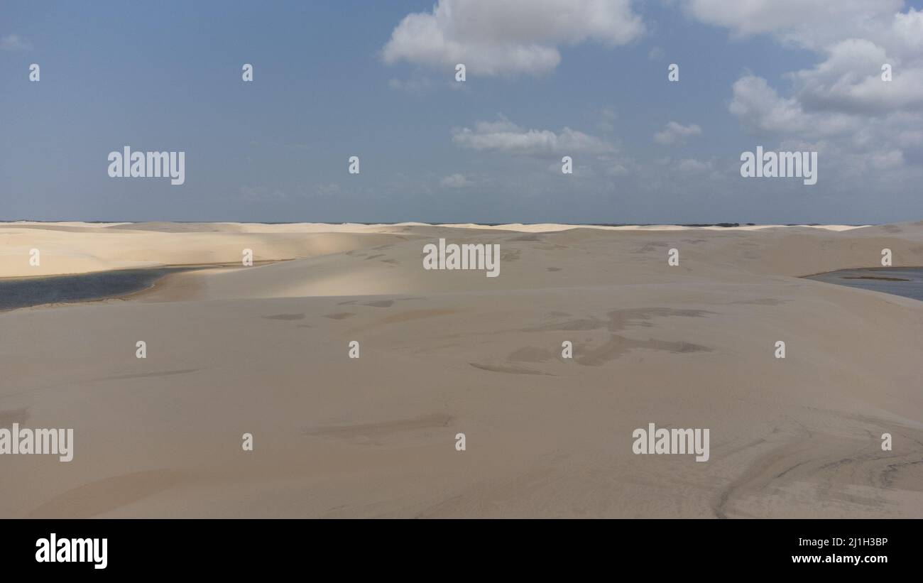 A view at sunset over the biggest lagoon in Lencois Maranhenses ...