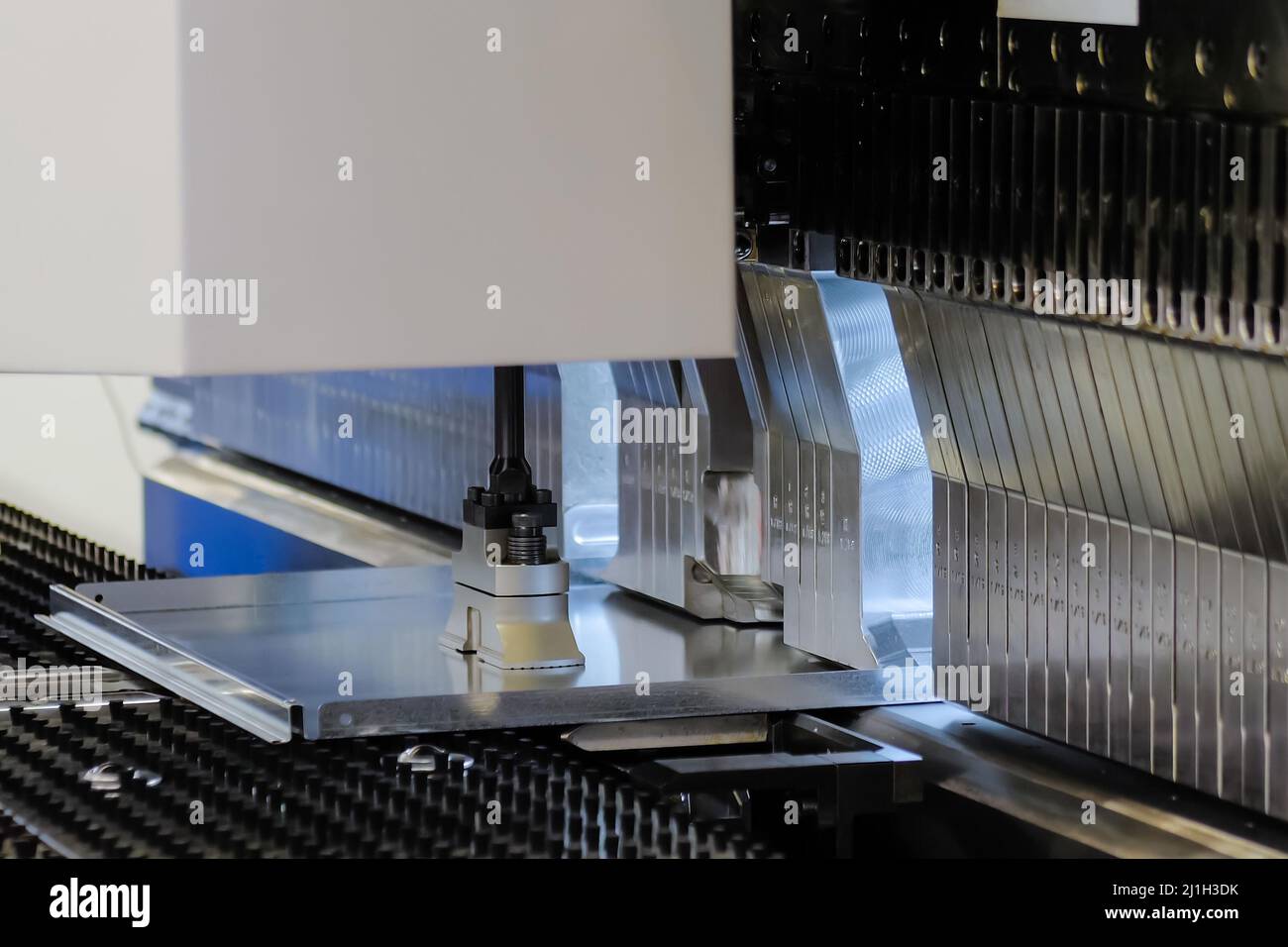 Automatic hydraulic bending machine working with sheet metal at factory ...