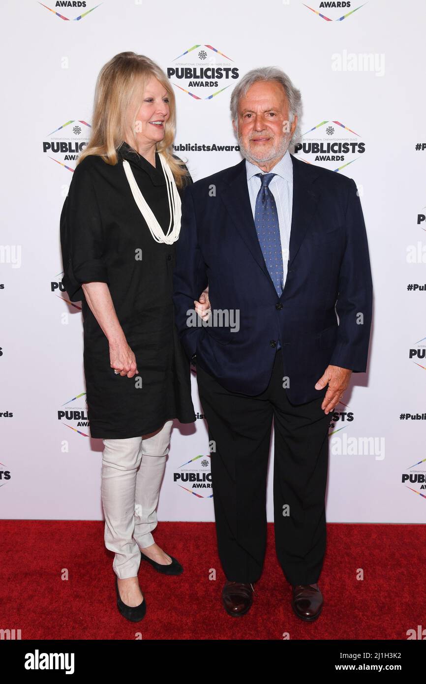 California, USA. 25th Mar, 2022. Nancy Hult Ganis and Sid Ganis walking ...