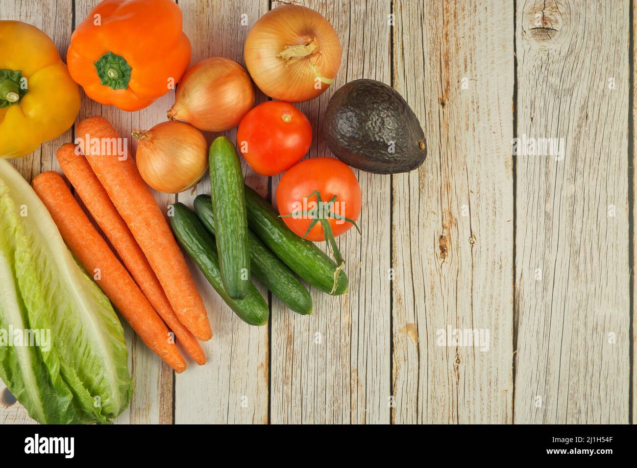 Fresh Summer Vegetables on a Rustic Wooden Table, overhead flat lay ...