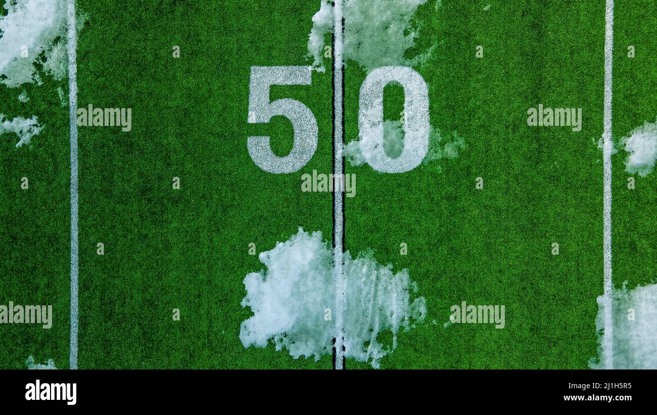 Aerial of snow covered football field Stock Photo - Alamy