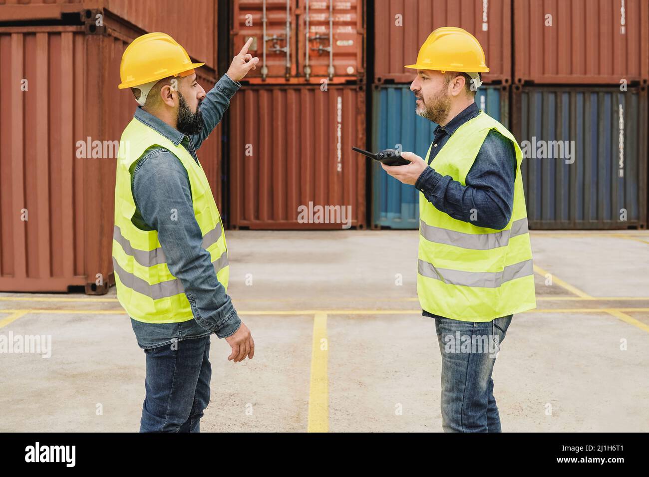 Industrial engineer people working at container cargo logistics ...