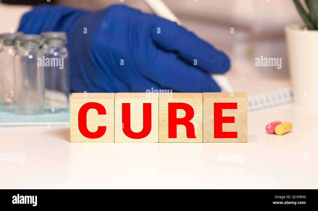 The word Cure written in vintage wooden letterpress type Stock Photo ...