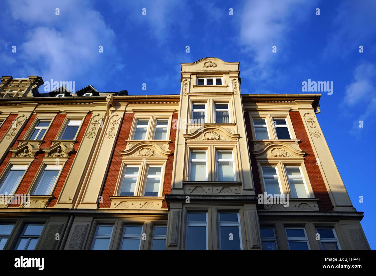 A low angle of a building with a blue sky on the background Stock Photo ...
