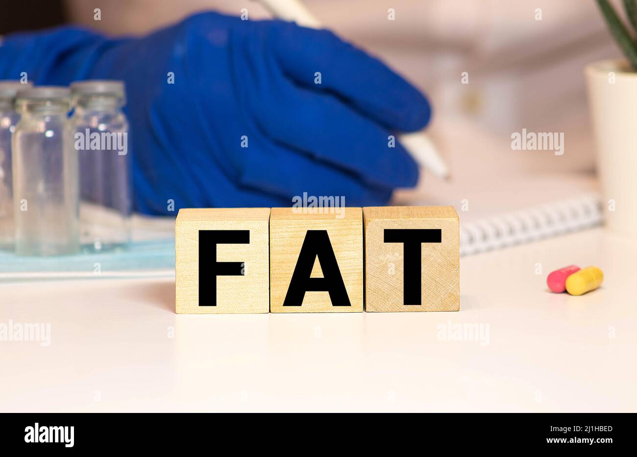 Reduce Fat Concept. Wooden Blocks In Declining Chart Stock Photo - Alamy