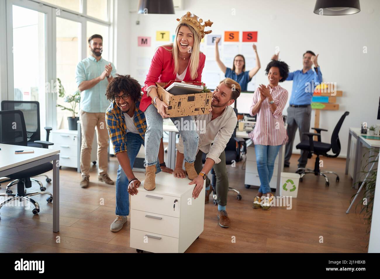 Group of casual corporate coworkers having fun in the office Stock ...