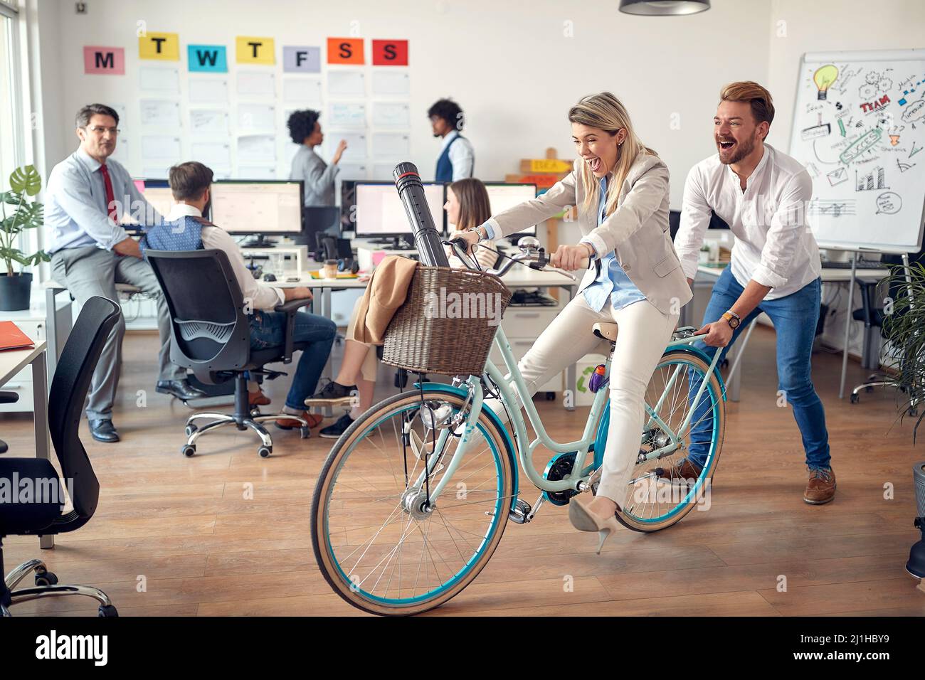 Happy work environment hi-res stock photography and images - Alamy