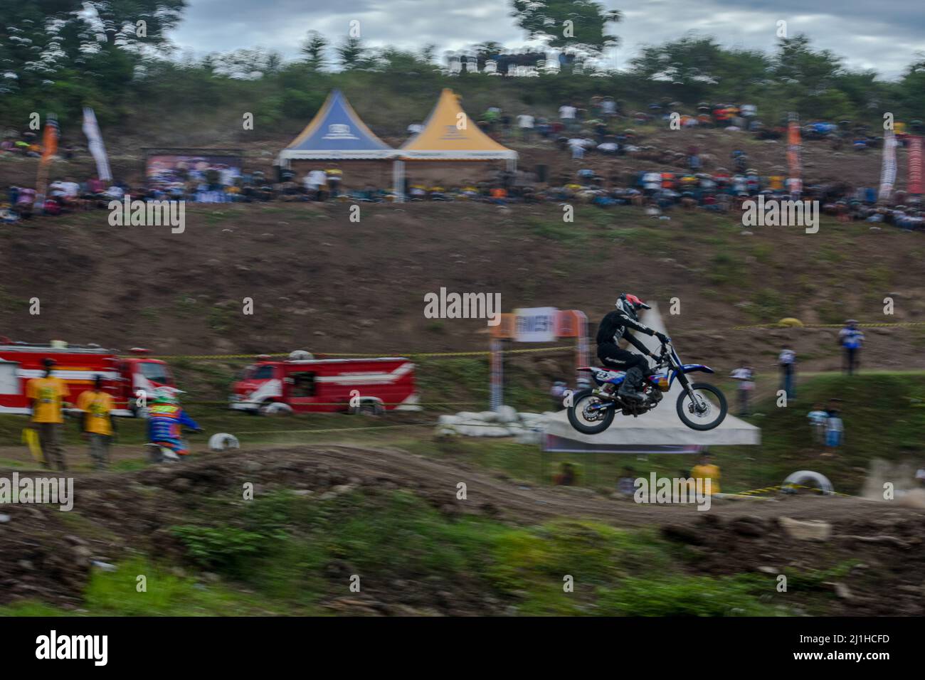 Soppeng, Indonesia. 23rd Mar, 2022. A local Indonesian motocross racer ...