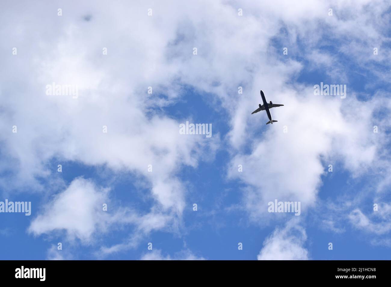 British Airways plane in blue sky over Kew Gardens in London Stock ...