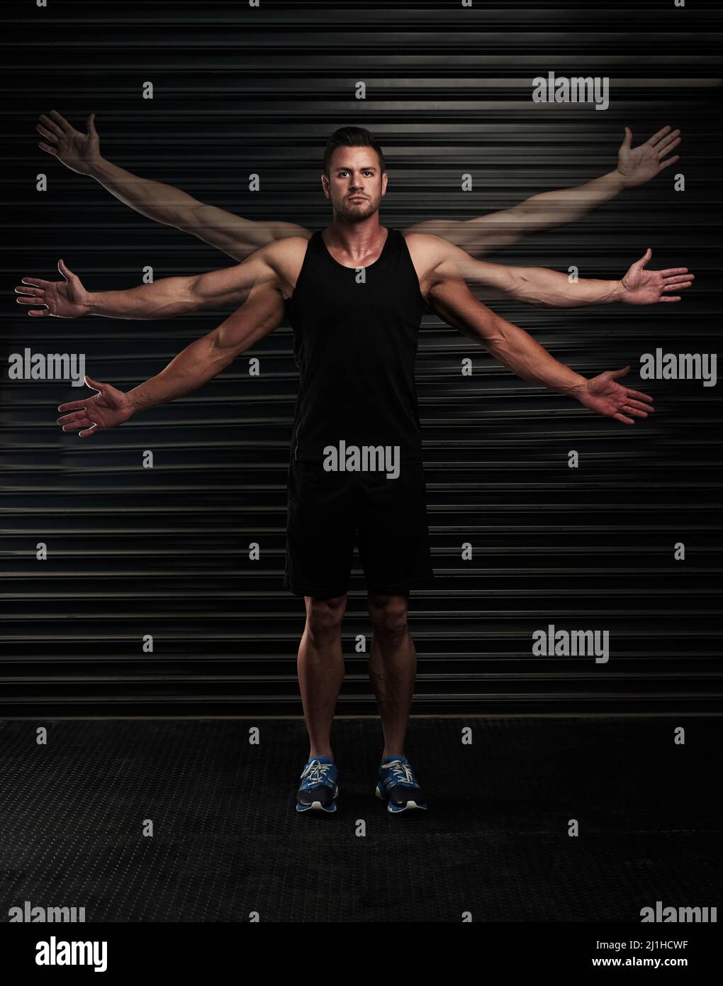 Hes got a full range of motion. Full length portrait of an athletic ...
