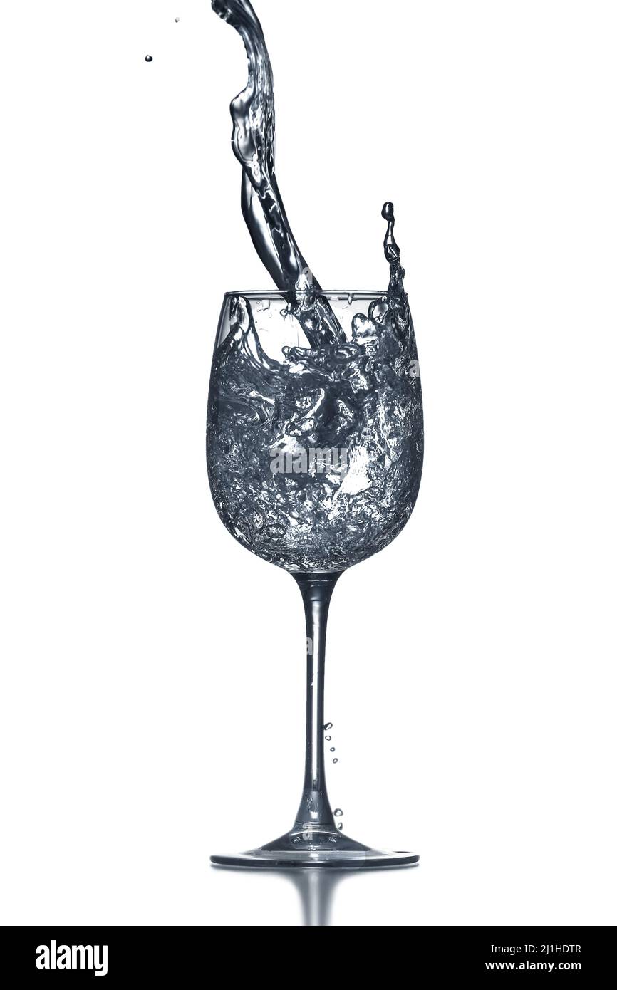 Glass of clean water with splash on white background Stock Photo - Alamy