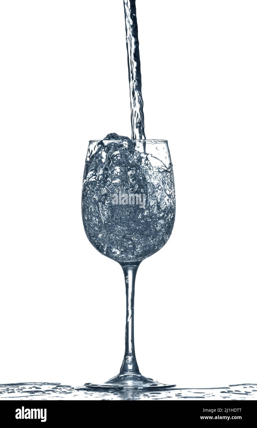 Glass of clean water with splash on white background Stock Photo - Alamy
