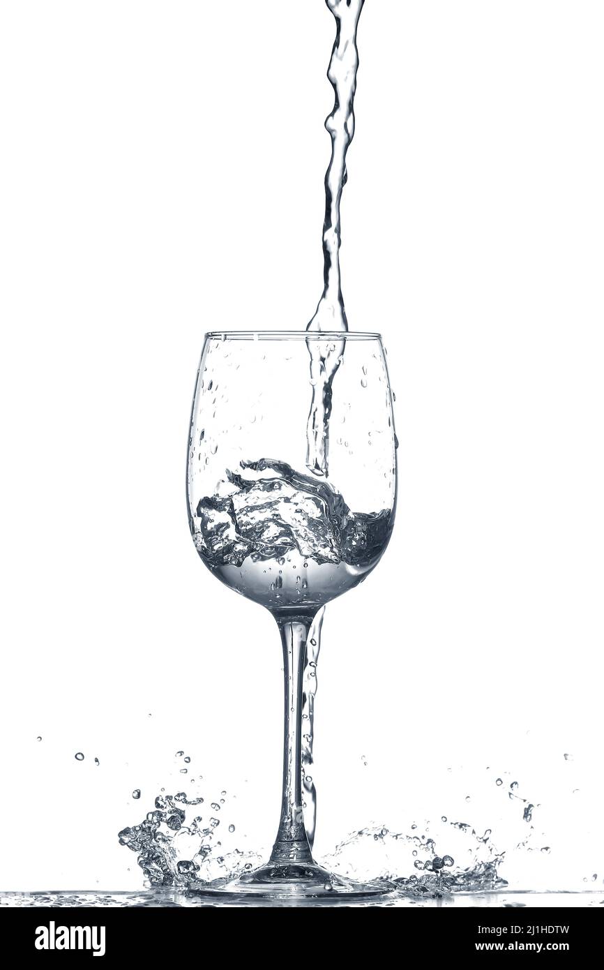 Glass of clean water with splash on white background Stock Photo - Alamy