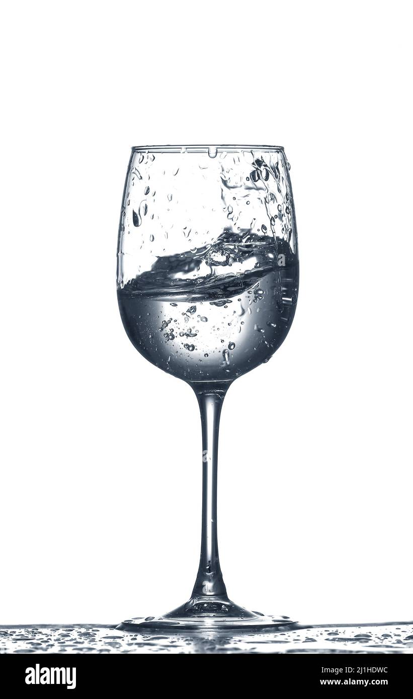 Glass of clean water with splash on white background Stock Photo - Alamy