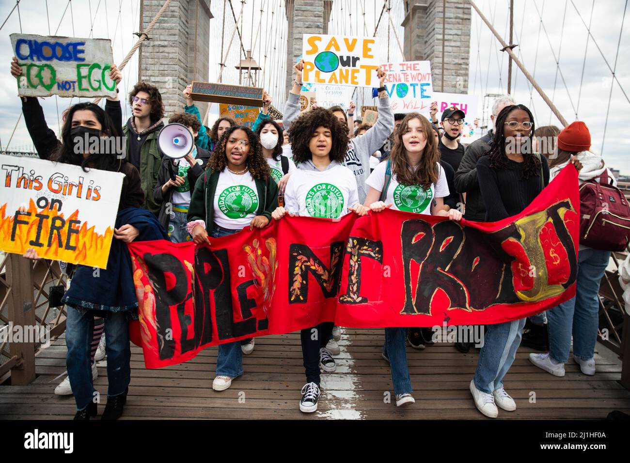 New York, USA. 25th Mar, 2022. Young Climate protesters chant slogans ...