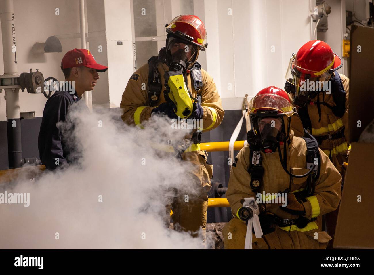 220323-N-TF178-1231 PACIFIC OCEAN (March 23, 2022) – Sailors combat a ...