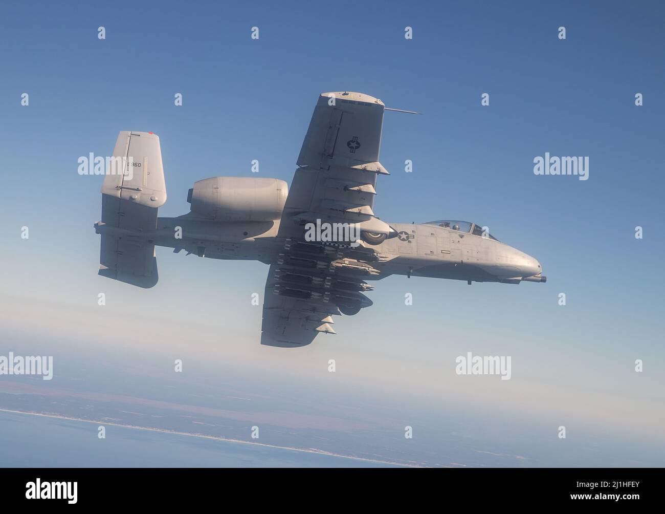 Maj Eric Hickernell from the 40th Flight Test Squadron flies an A-10C ...