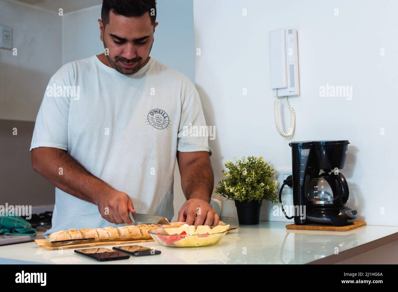 Preparing appetizers hi-res stock photography and images - Alamy