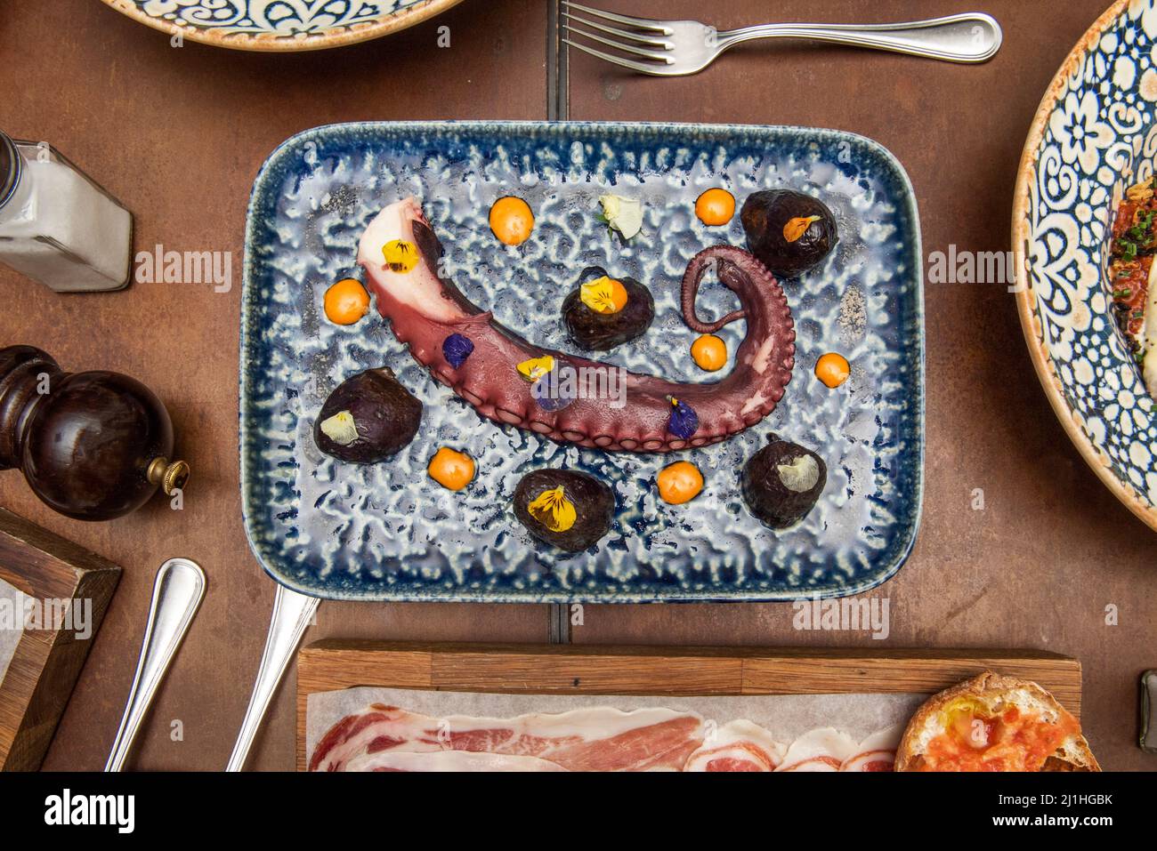 The popular octopus á feira, standard of Galician gastronomy, is ...