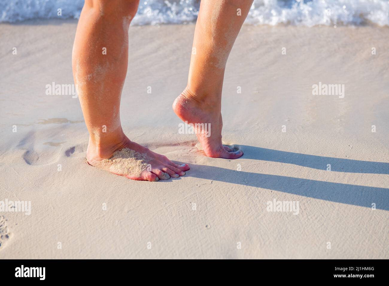 Feet beach waves hi-res stock photography and images - Alamy
