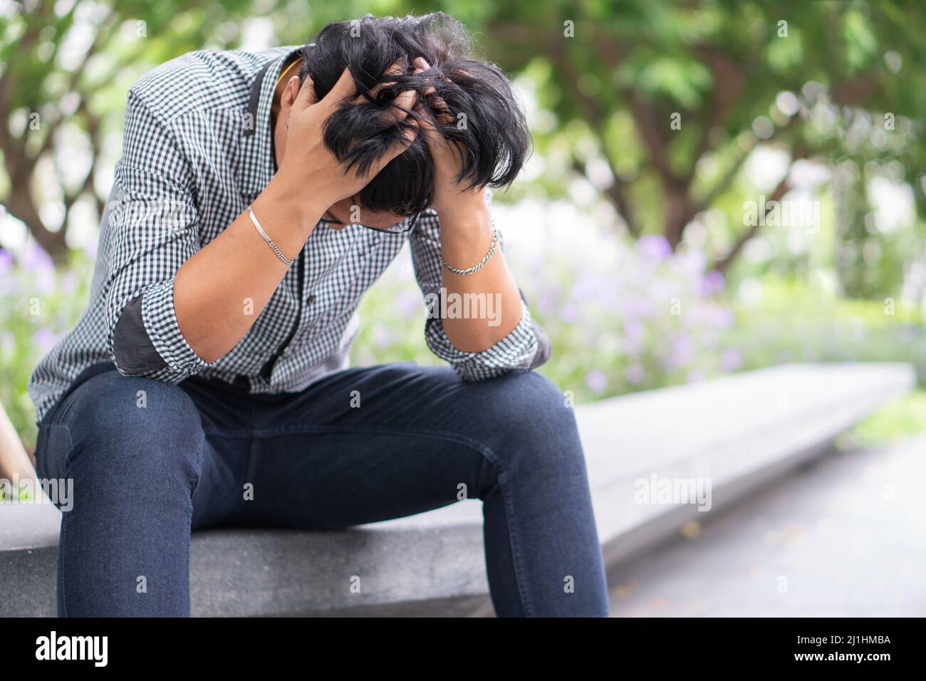 Negative emotion facial expression feelings. Stressed Asian businessman ...