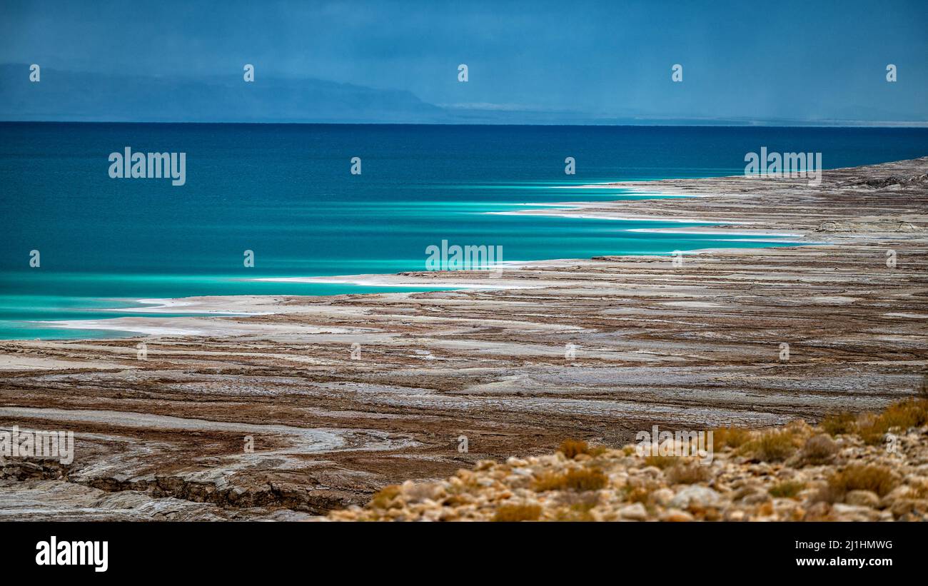 Salt beach of the Dead Sea in Jordan Stock Photo - Alamy