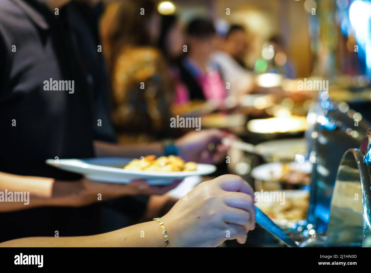 Crowd of people enjoying buffet food meal dining Food Options Eating ...