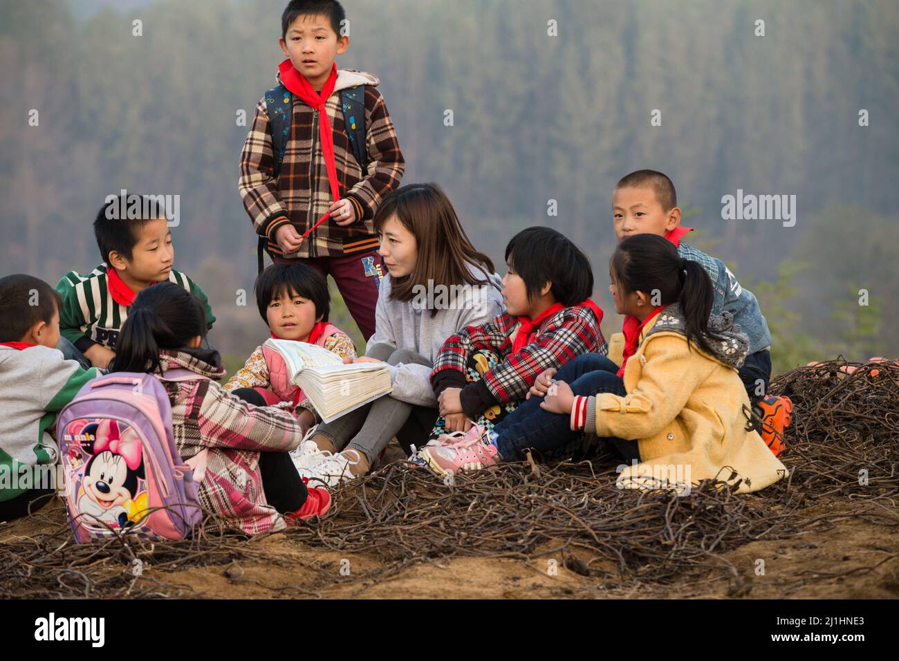 Rural teachers and pupils learning in the open air Stock Photo - Alamy