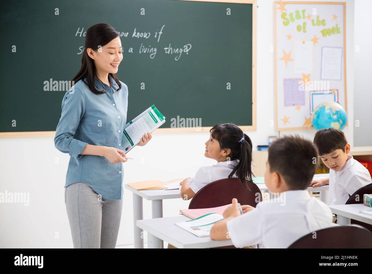 Four teachers table hi-res stock photography and images - Alamy