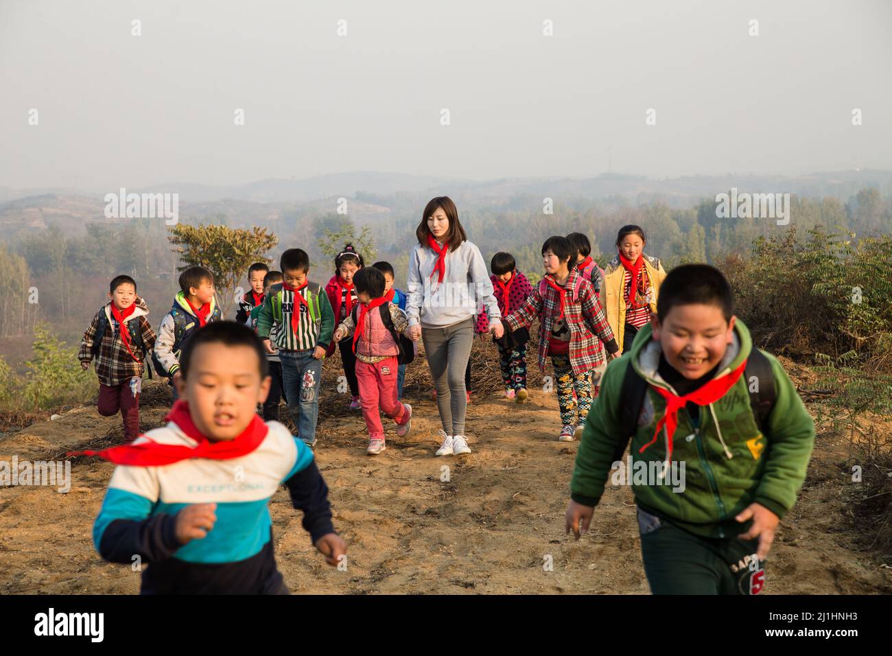 Rural teachers and pupils learning in the open air Stock Photo - Alamy