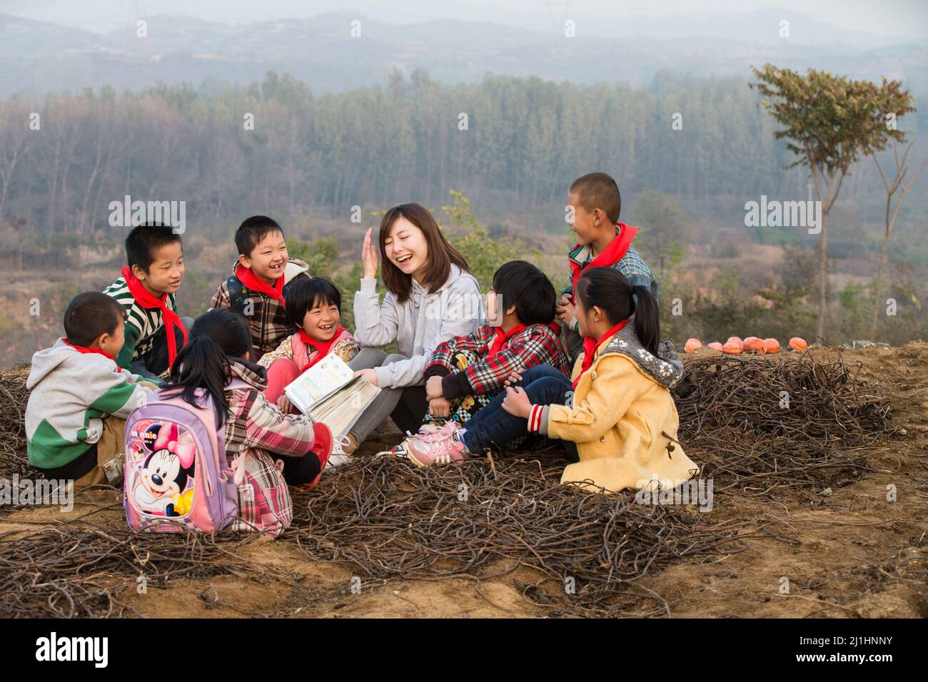 Rural teachers and pupils learning in the open air Stock Photo - Alamy