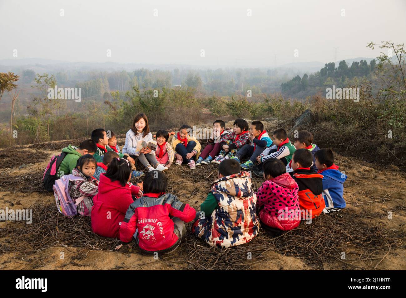 Rural teachers and pupils learning in the open air Stock Photo - Alamy