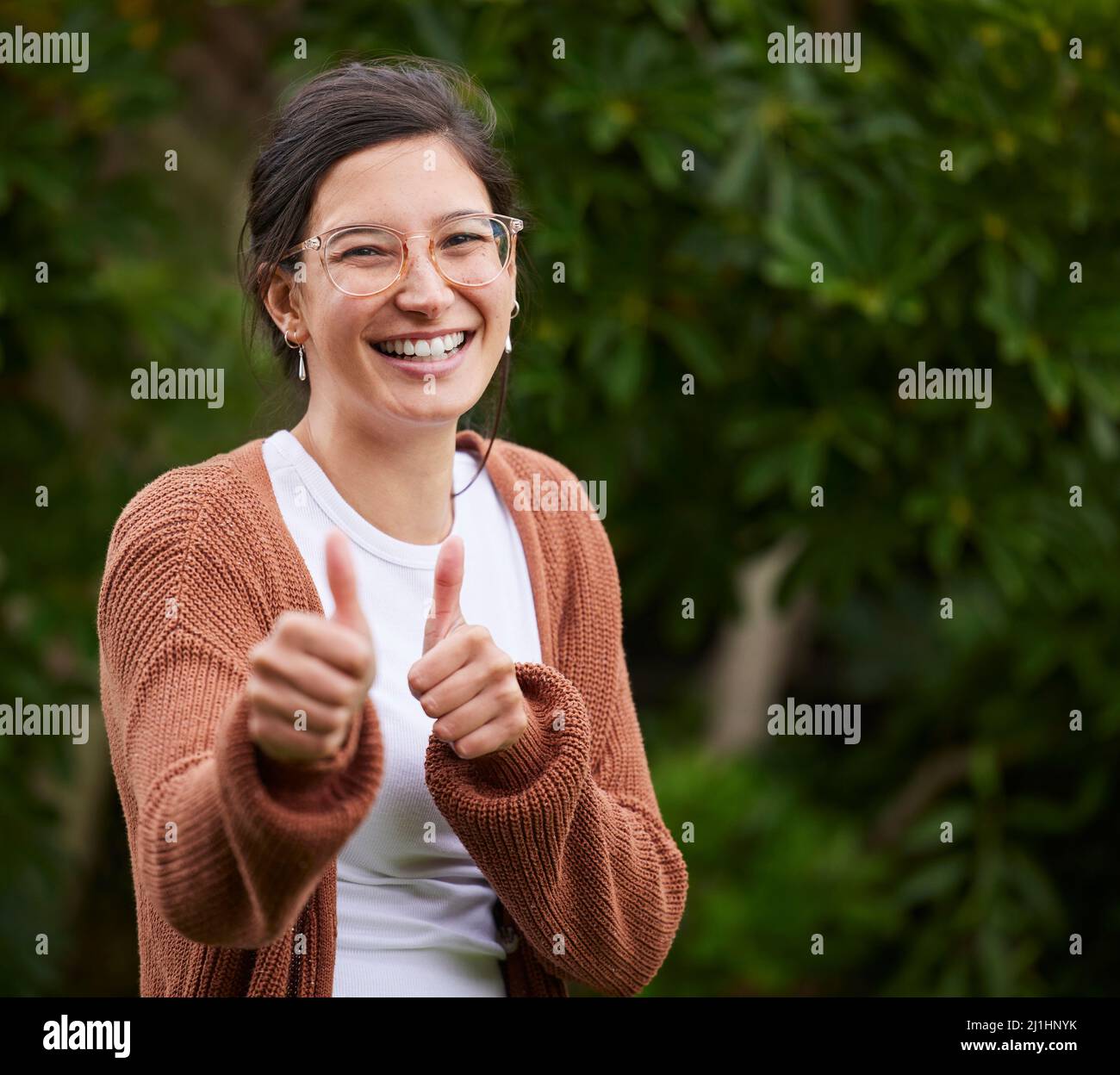 Hope alls good your side too. Portrait of a cheerful young woman ...