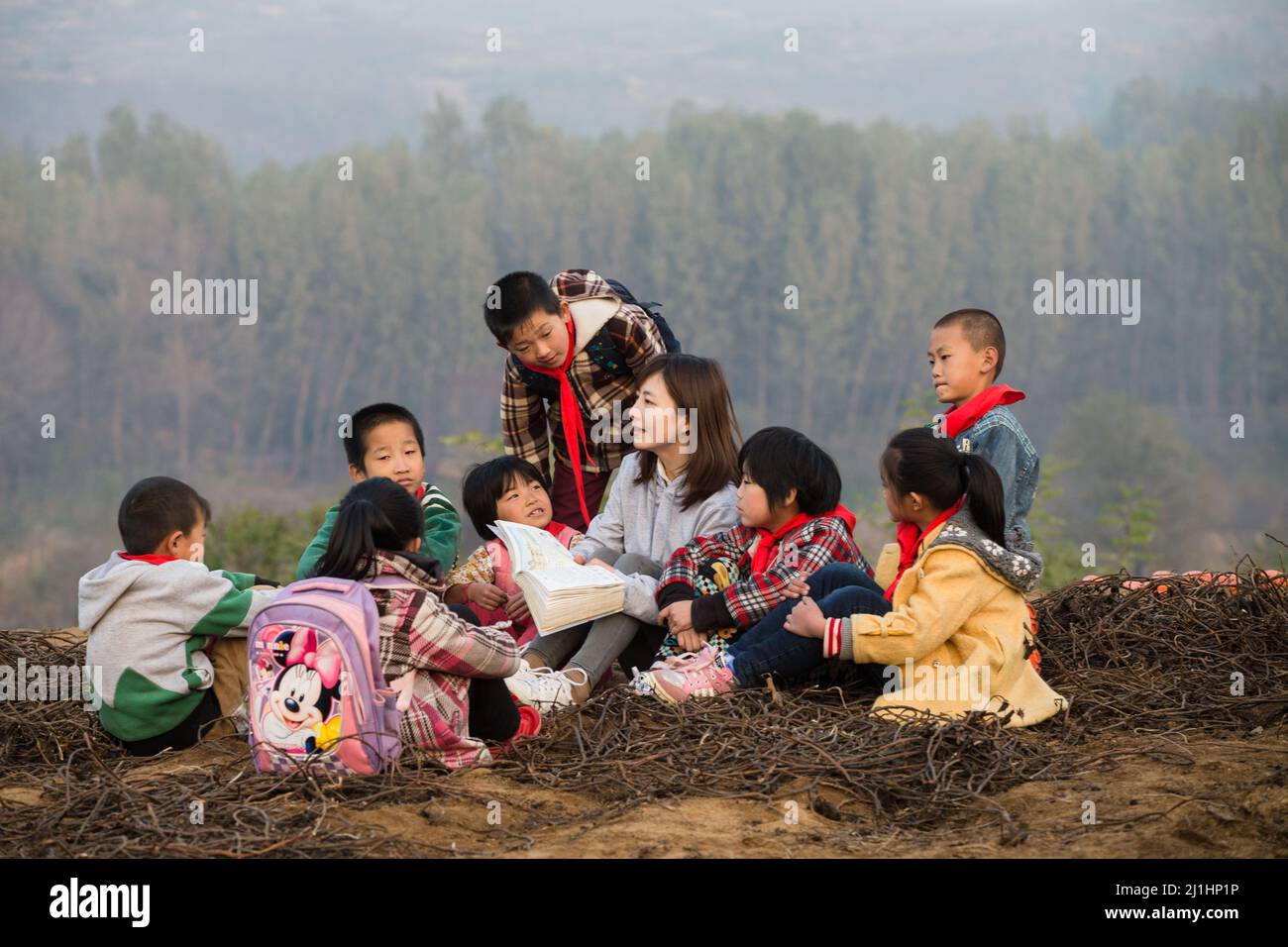 Rural teachers and pupils learning in the open air Stock Photo - Alamy