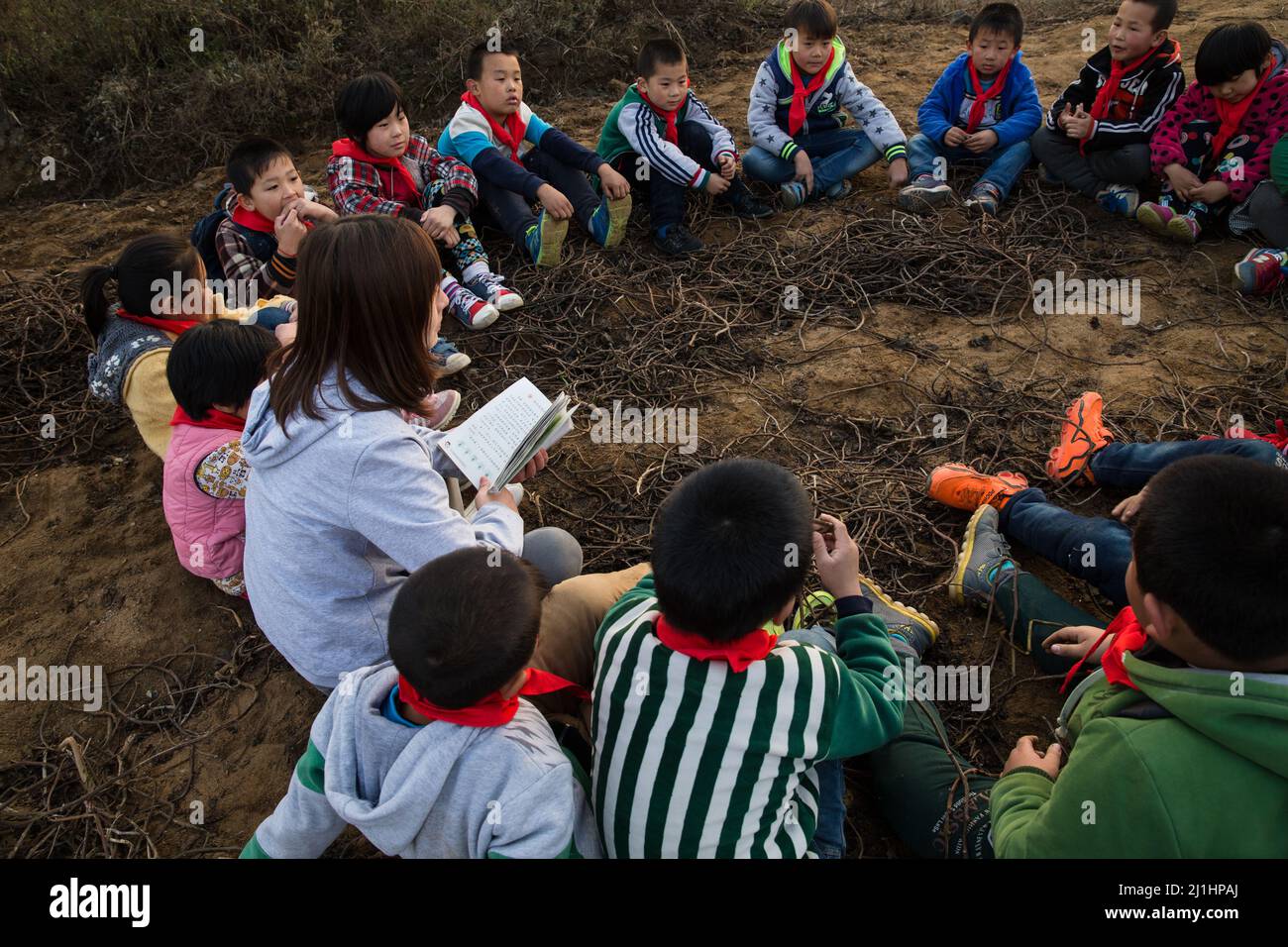 Rural teachers and pupils learning in the open air Stock Photo - Alamy