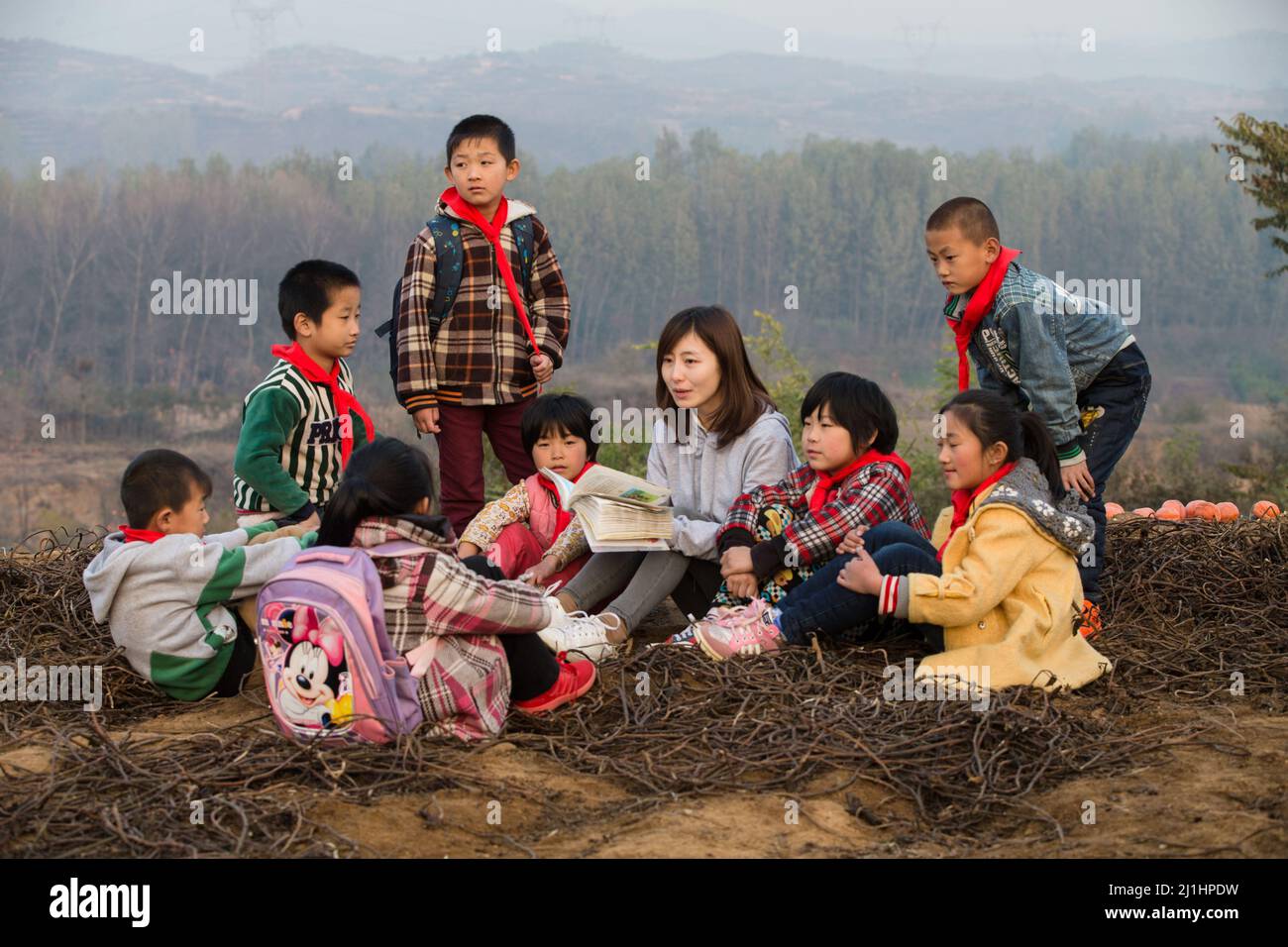 Rural teachers and pupils learning in the open air Stock Photo - Alamy