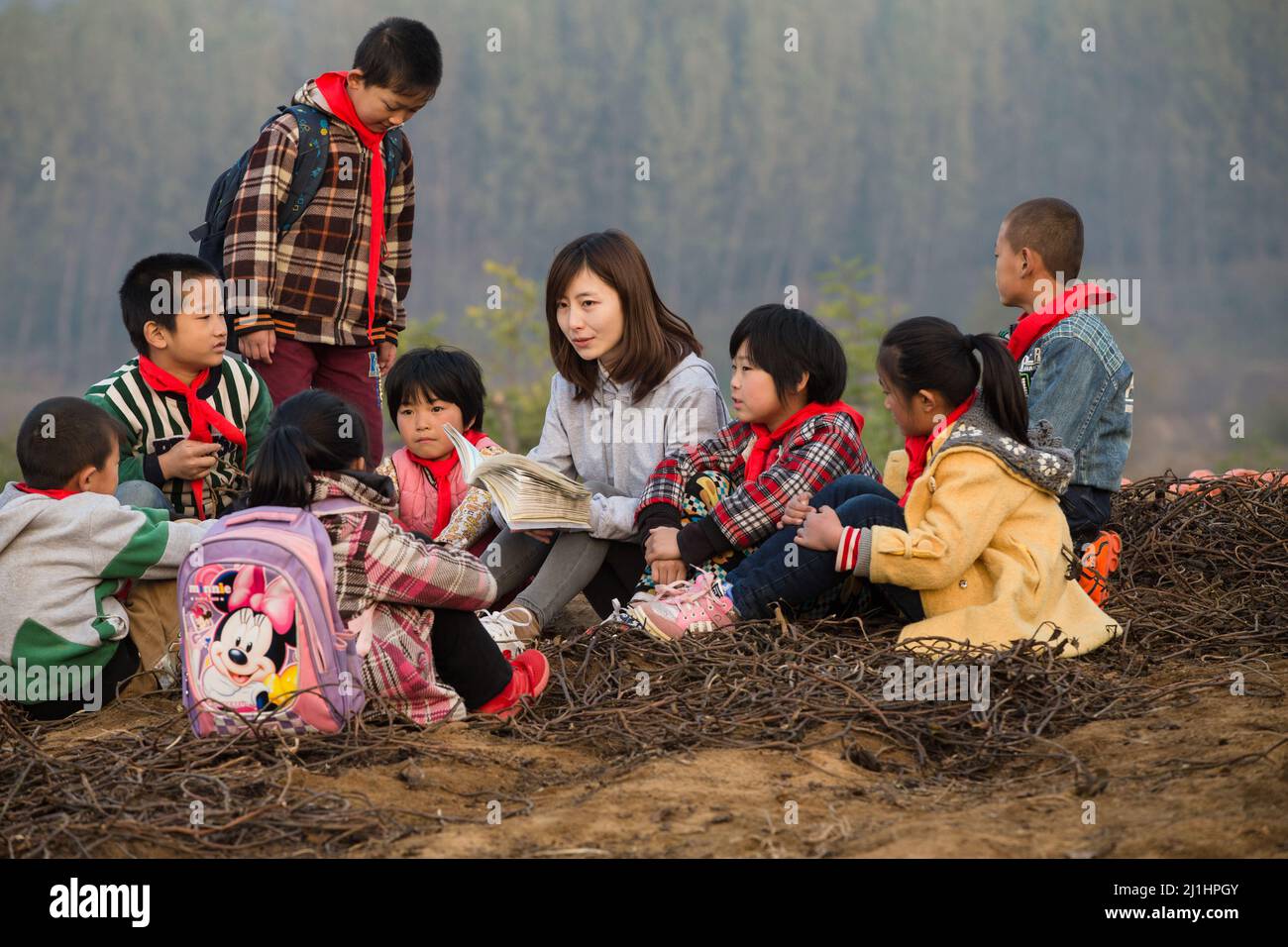 Rural teachers and pupils learning in the open air Stock Photo - Alamy