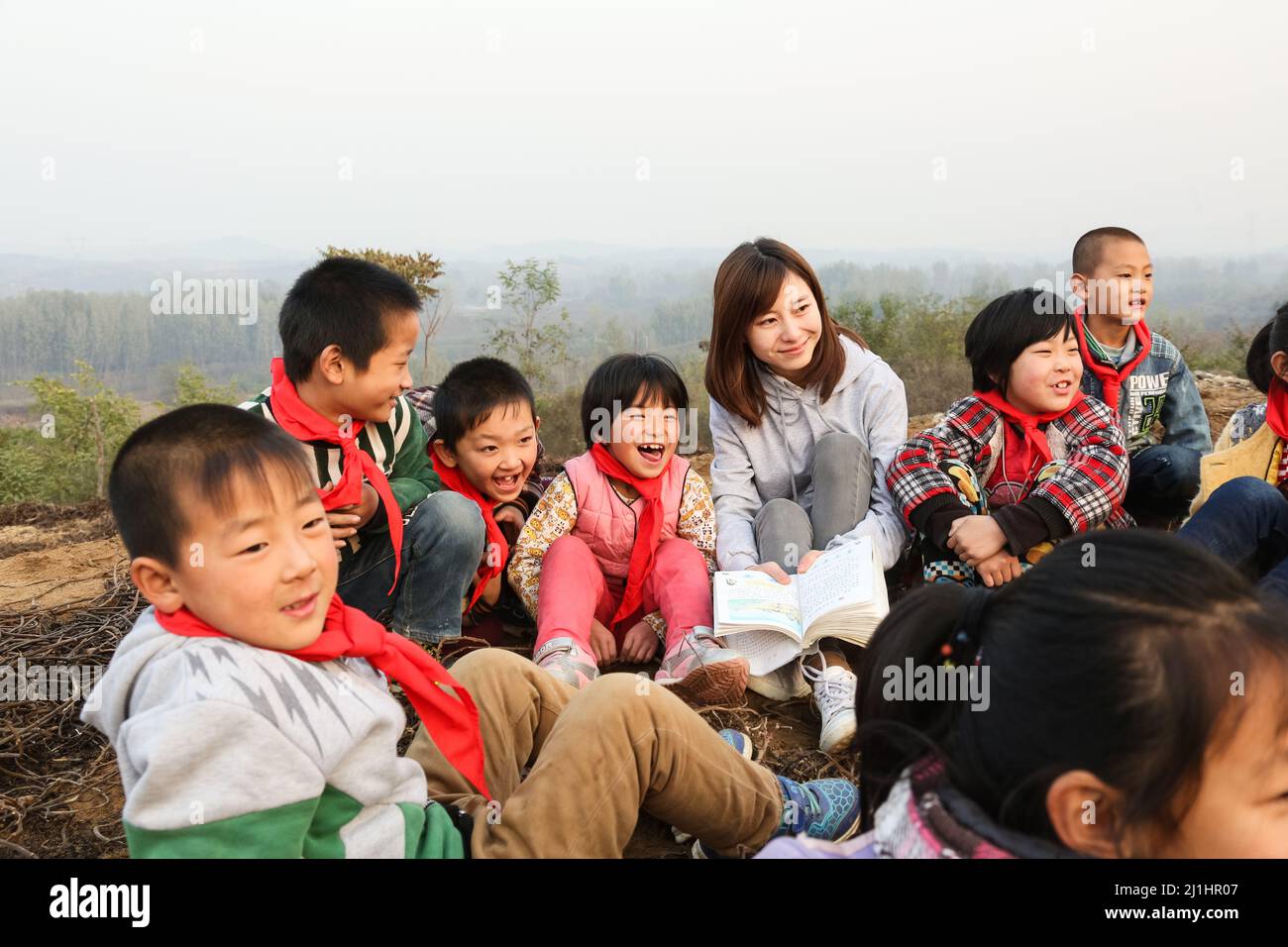 Rural teachers and pupils learning in the open air Stock Photo - Alamy