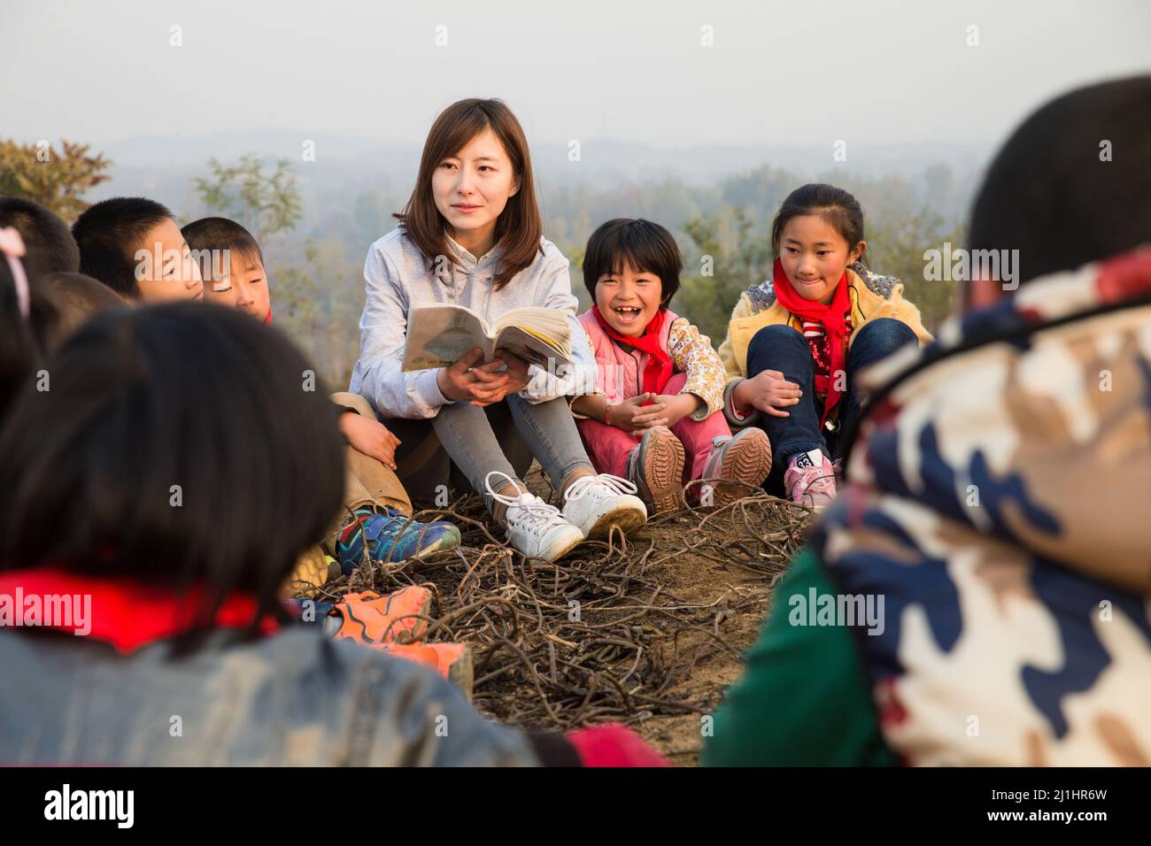 Rural teachers and pupils learning in the open air Stock Photo - Alamy