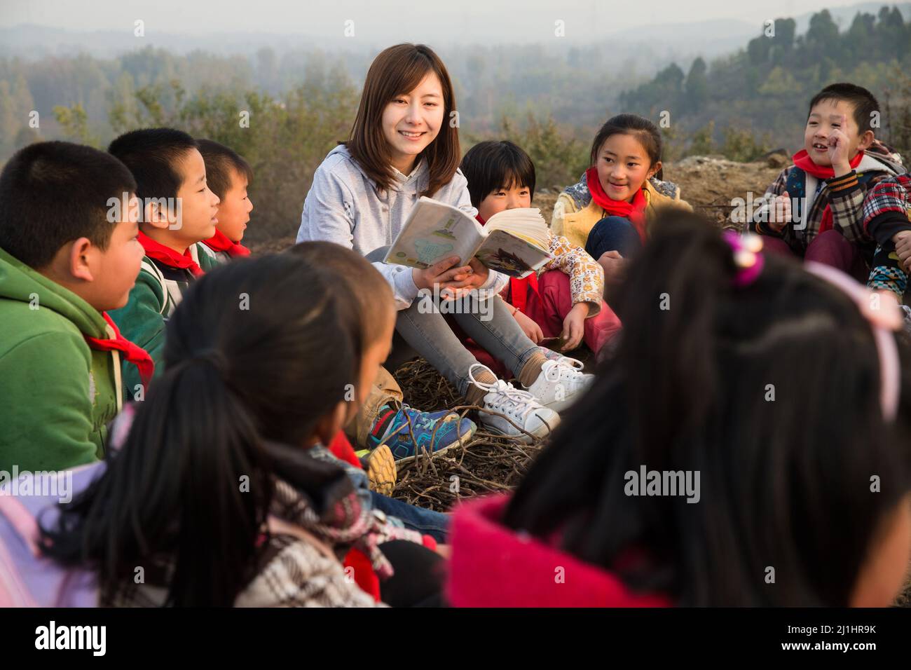 Rural teachers and pupils learning in the open air Stock Photo - Alamy