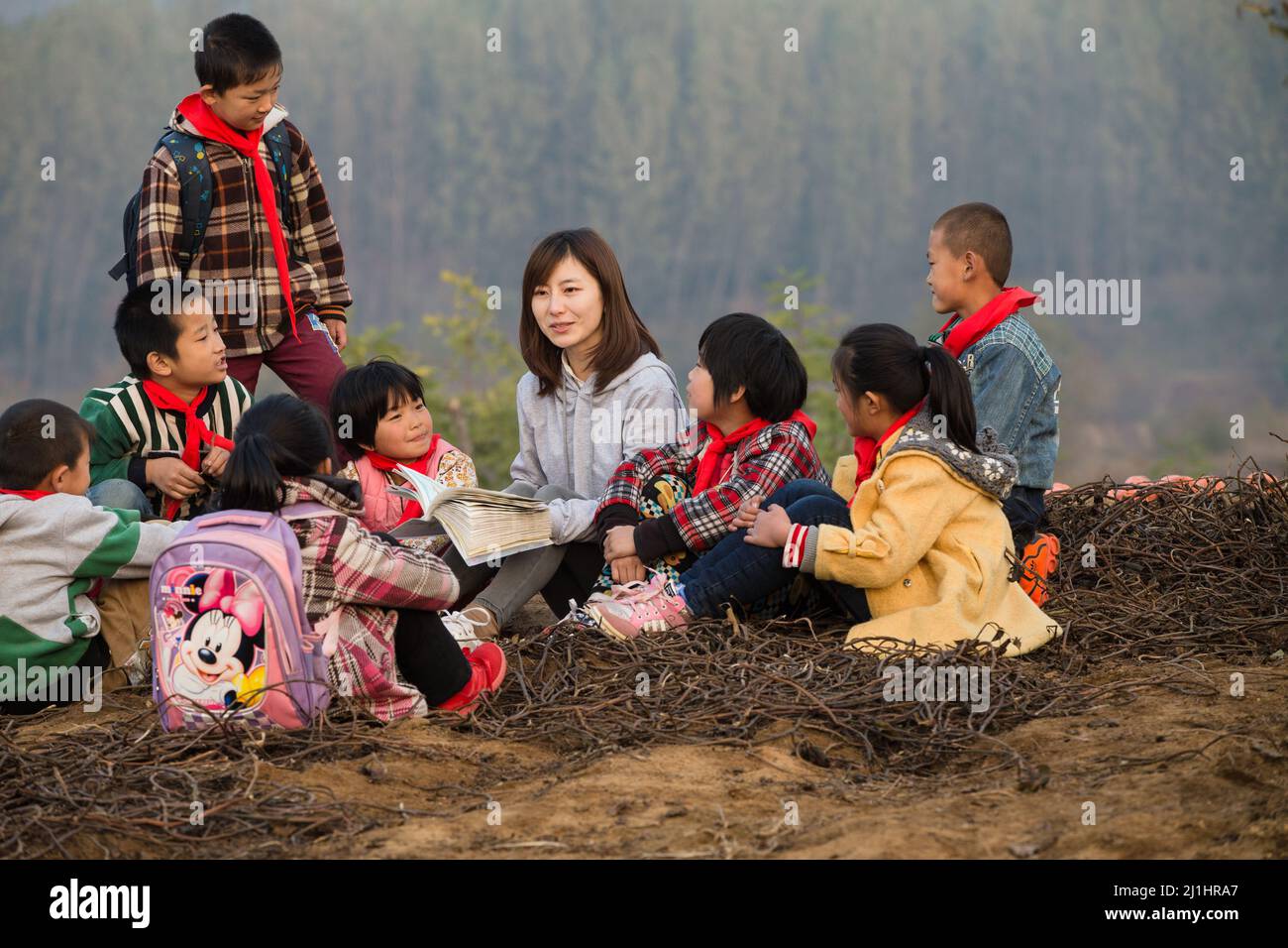 Rural teachers and pupils learning in the open air Stock Photo - Alamy