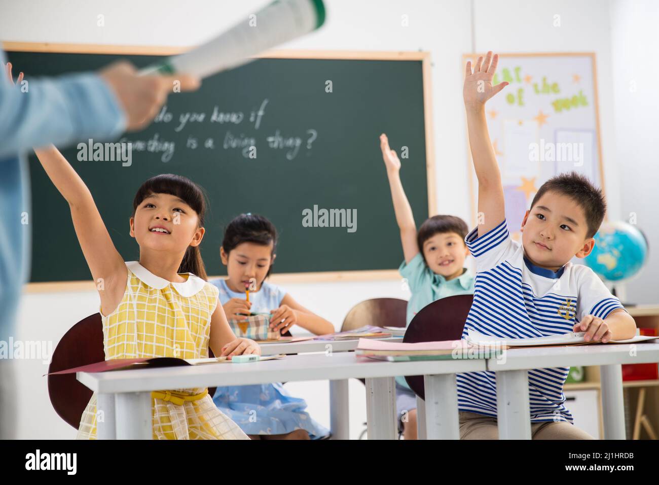 Teachers and pupils in the classroom Stock Photo - Alamy