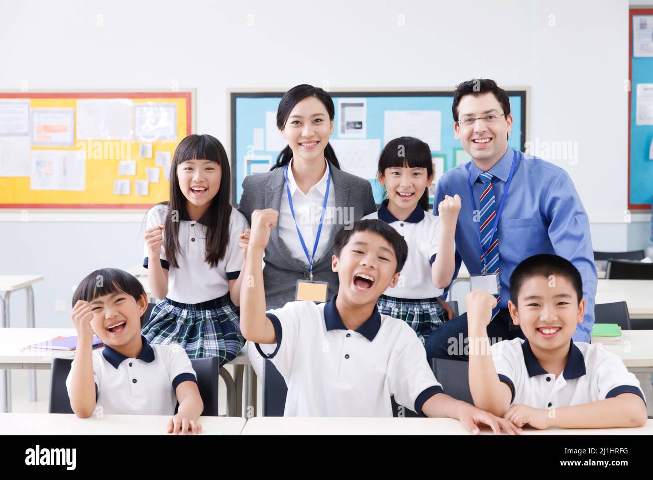 Teachers and pupils in the classroom Stock Photo - Alamy