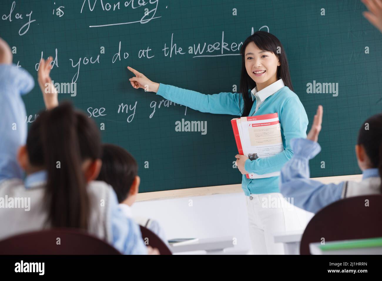 Elementary school students and teachers in class Stock Photo - Alamy