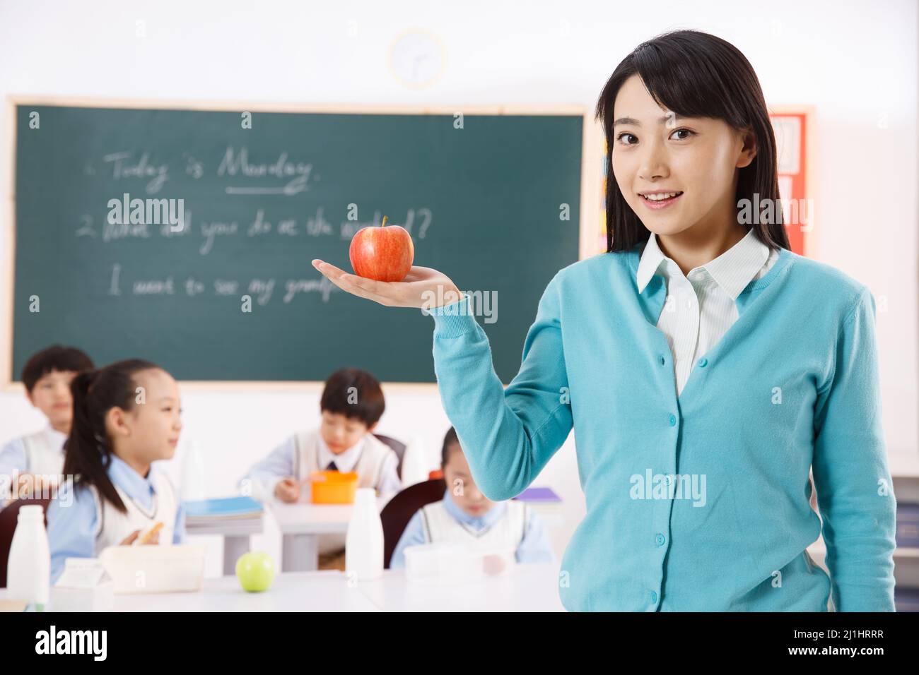 Elementary school students and teachers in class Stock Photo - Alamy