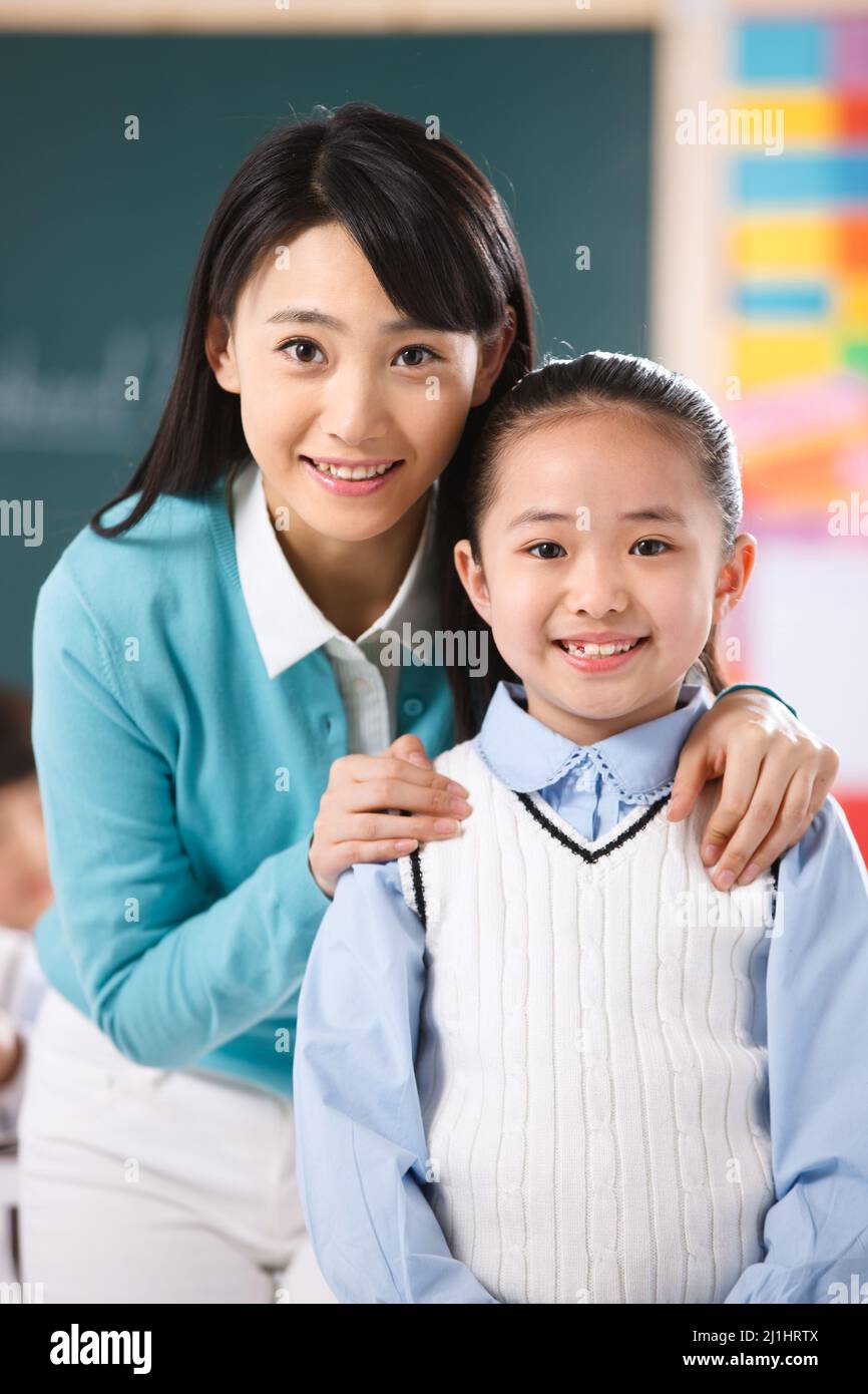 Two teachers in class hi-res stock photography and images - Alamy
