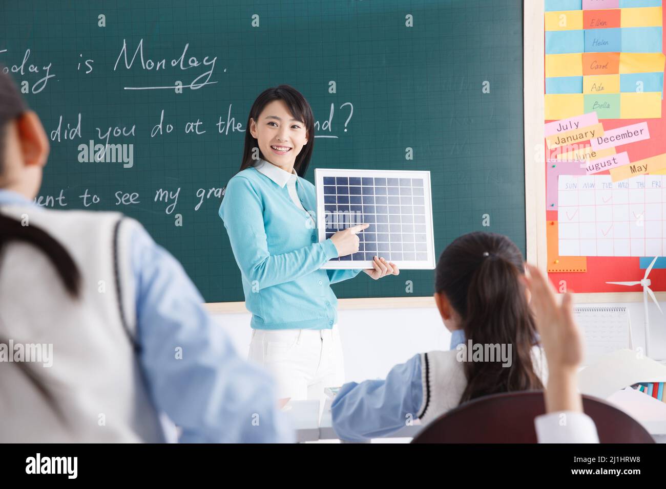 Elementary school students and teachers in class Stock Photo - Alamy
